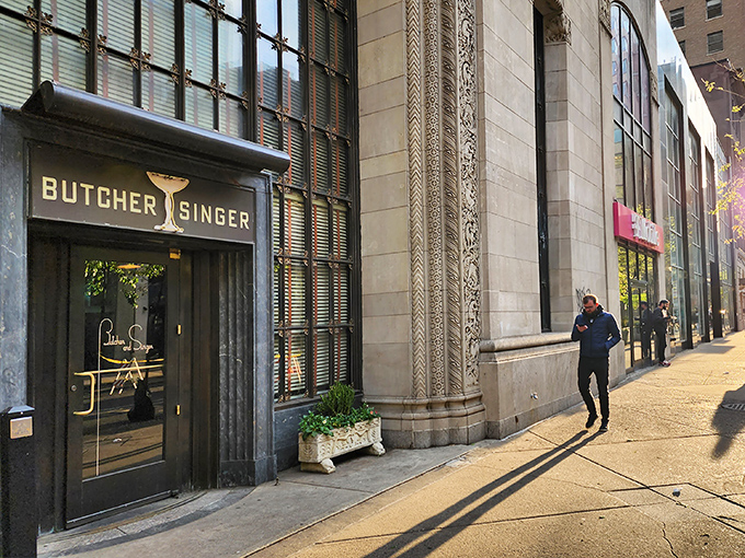 The unassuming entrance to Butcher and Singer belies the culinary magic within. Like finding a secret passage to carnivore heaven on Walnut Street.