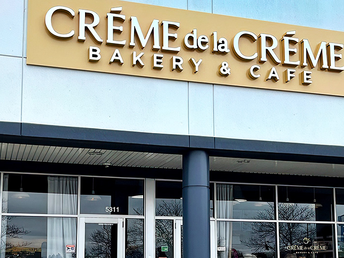 The elegant gold signage of Cr&eacute;me de la Cr&eacute;me beckons like a beacon of buttery hope in Columbus. Resistance is futile.