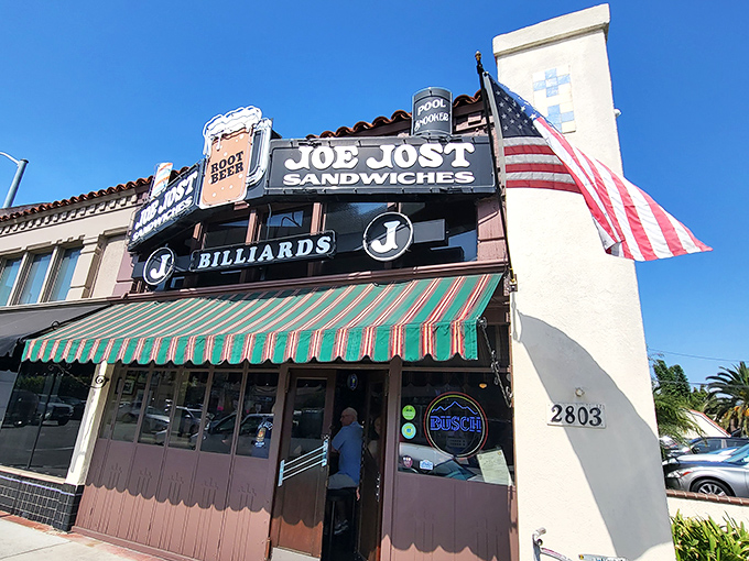 A slice of Americana stands proudly on East Anaheim Street, where Joe Jost's iconic green and red awning has welcomed thirsty Long Beach locals since Prohibition ended.