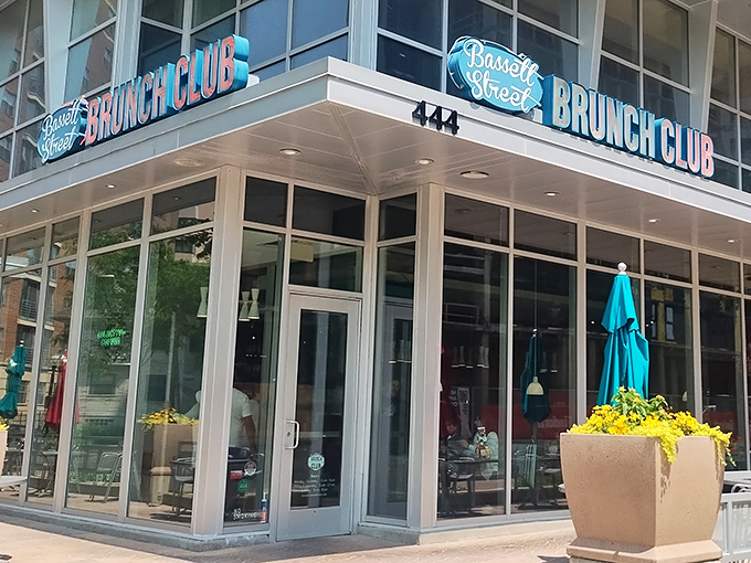 The corner beacon of breakfast bliss! Bassett Street Brunch Club's modern exterior promises morning magic with its bright signage and welcoming windows.