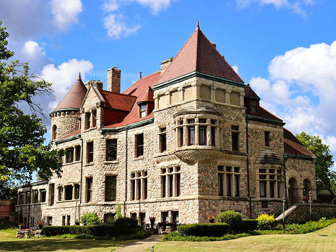 The Studebaker mansion stands like a stone sentinel against the Indiana sky, a Romanesque reminder that automobile tycoons knew how to live large.