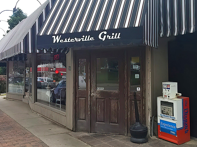 The classic striped awning of Westerville Grill beckons like an old friend promising comfort food and conversation in equal measure.