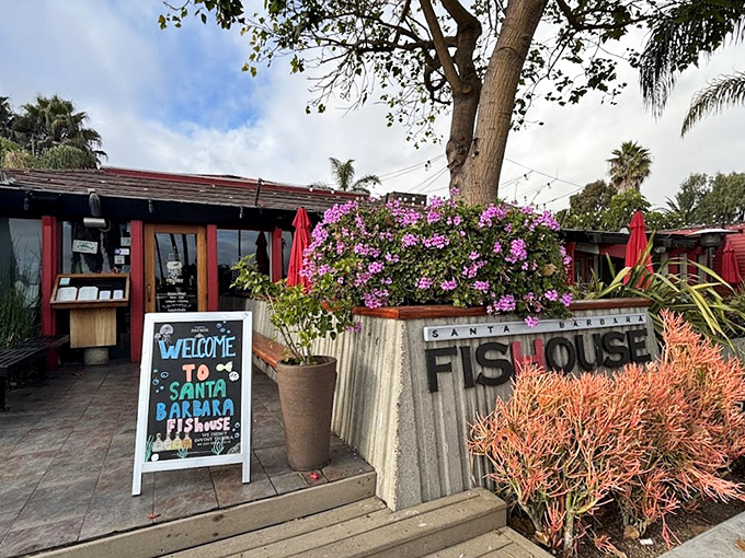 The entrance to seafood paradise! Santa Barbara FisHouse welcomes you with vibrant bougainvillea and that quintessential California coastal charm.