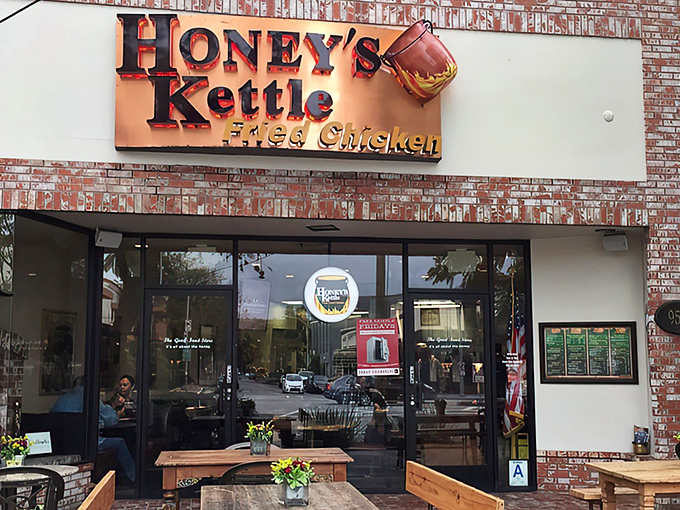 The unassuming brick facade of Honey's Kettle hides culinary greatness within, like finding a Picasso at a yard sale.