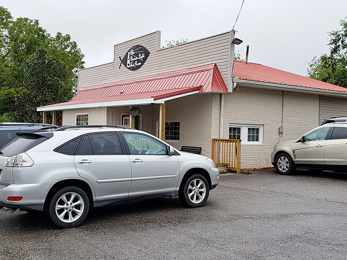 The unassuming exterior of Beacon Light Tea Room beckons hungry travelers with its distinctive fish sign—proof that culinary treasures often hide in plain sight.