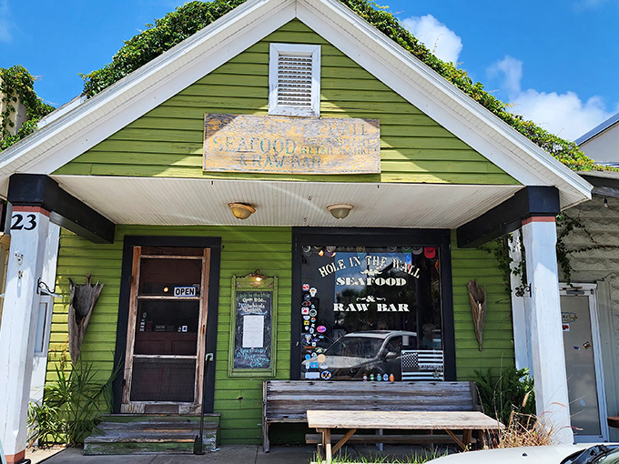 The lime-green cottage with "Hole Is The Wall" emblazoned above the door isn't trying to be fancy&mdash;it's promising something better: authenticity with a side of seafood perfection.