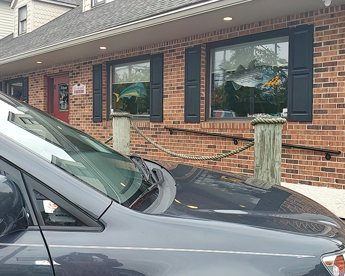 The brick facade promises seafood excellence, and those windows practically wink at passing food lovers.