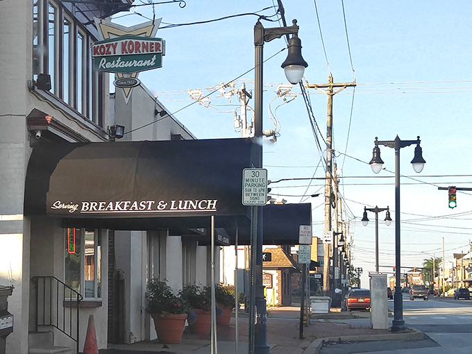 That vintage neon sign hanging above Kozy Korner isn't just advertising &ndash; it's a time portal to when diners were the social media of their day.