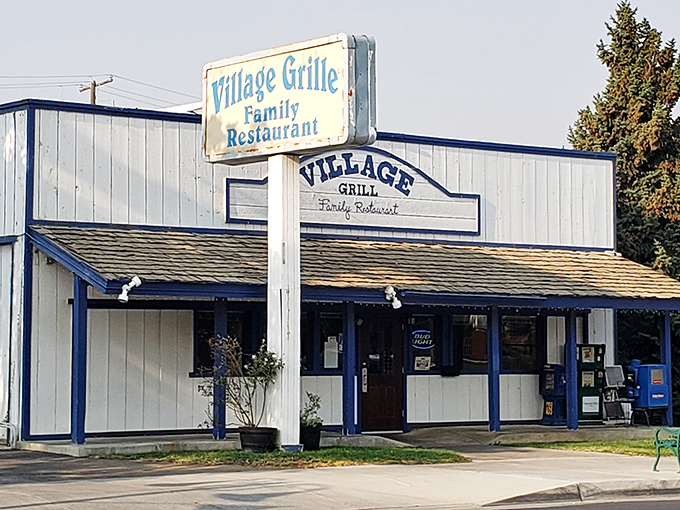 The classic blue and white exterior of Village Grill stands as a beacon of comfort food in Tehachapi, promising homestyle cooking that transcends trends.