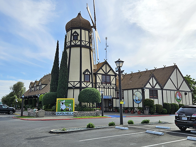 The iconic windmill of Pea Soup Andersen's stands like a Danish mirage in the California heat, beckoning road-weary travelers with promises of comfort food and quirky charm.