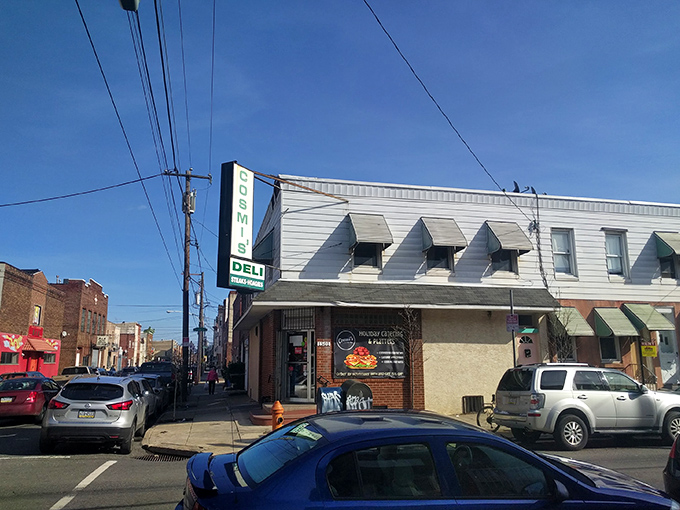 The unassuming corner storefront of Cosmi's Deli stands like a sandwich sentinel in South Philly, promising delicious treasures within for those in the know.