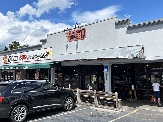 The unassuming storefront of Community Q BBQ might not stop traffic, but what's happening inside should be headline news across Georgia.