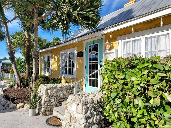 The sunny yellow exterior of The Porch Restaurant beckons like a cheerful neighbor who happens to be an exceptional cook. Those turquoise accents just scream "Florida vacation mode activated!"