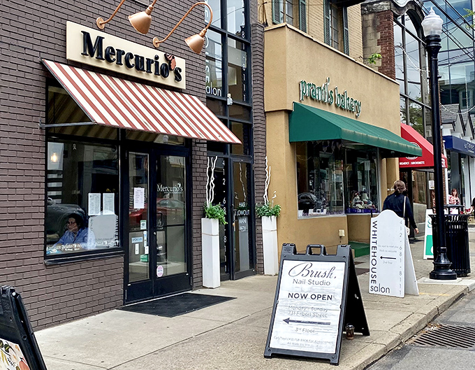 The unassuming storefront with its classic red and white awning hides pizza greatness within. Mercurio's exterior is Pittsburgh's best-kept Italian secret.