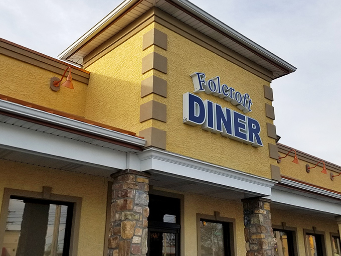 The golden exterior of Folcroft Diner beckons like a beacon of breakfast hope. Even on cloudy days, this Delaware County institution promises sunshine on a plate.