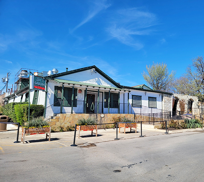 The unassuming exterior of Joe T. Garcia's hides a culinary wonderland within, like finding Narnia behind a modest wardrobe door.