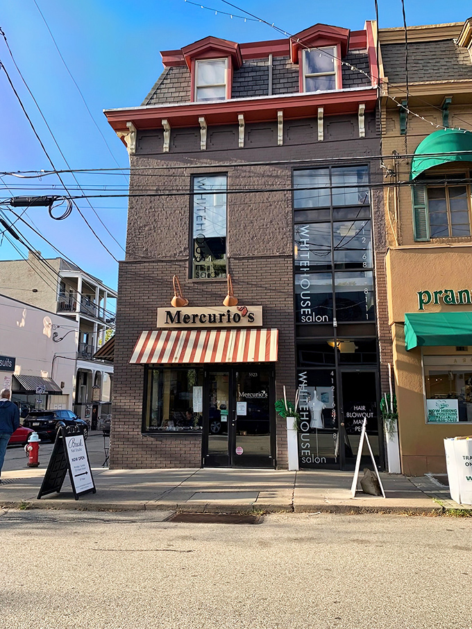 Mercurio's charming brick exterior in Pittsburgh's Shadyside neighborhood beckons with its classic red and white awning—like a little slice of Italy nestled between urban storefronts.