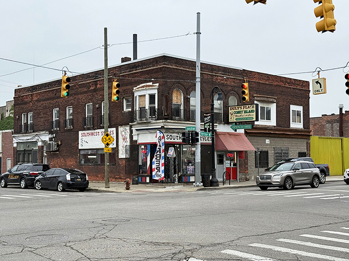 The corner brick building stands like a time capsule of Detroit dining history, beckoning hungry travelers with unpretentious charm.