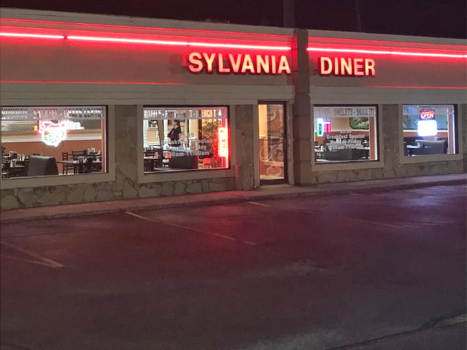 The unassuming storefront with bold red lettering belies the culinary treasures within. Like finding a diamond in a strip mall setting.