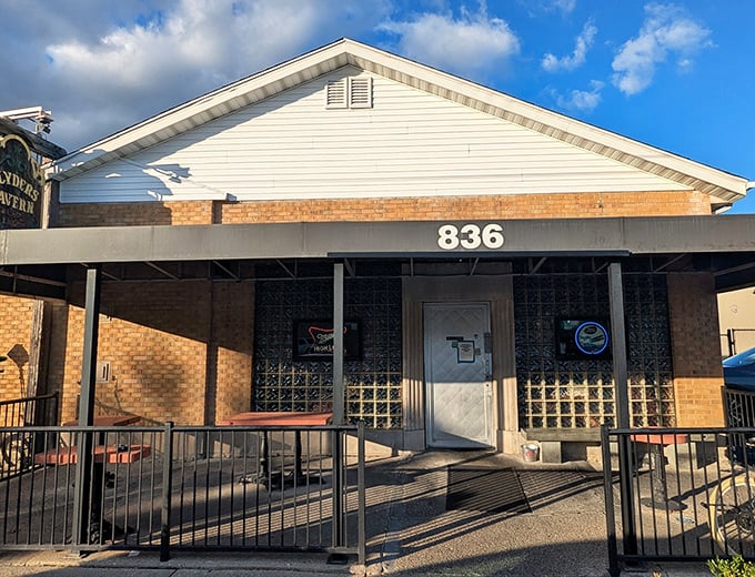 The unassuming brick exterior of Slyder's Tavern stands as a beacon to those who know that culinary treasures often hide in plain sight.