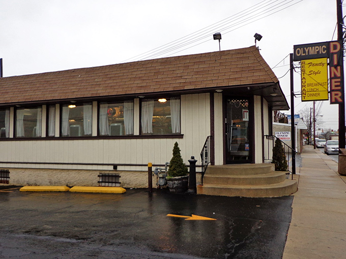 The humble exterior of Olympic Diner belies the culinary treasures within. This unassuming beige building has been feeding hungry Pennsylvanians for generations.
