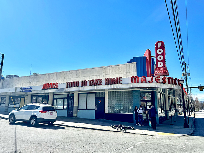 The neon promise of "FOOD THAT PLEASES" has been Atlanta's most honest advertising campaign for decades. Classic Americana at its finest.