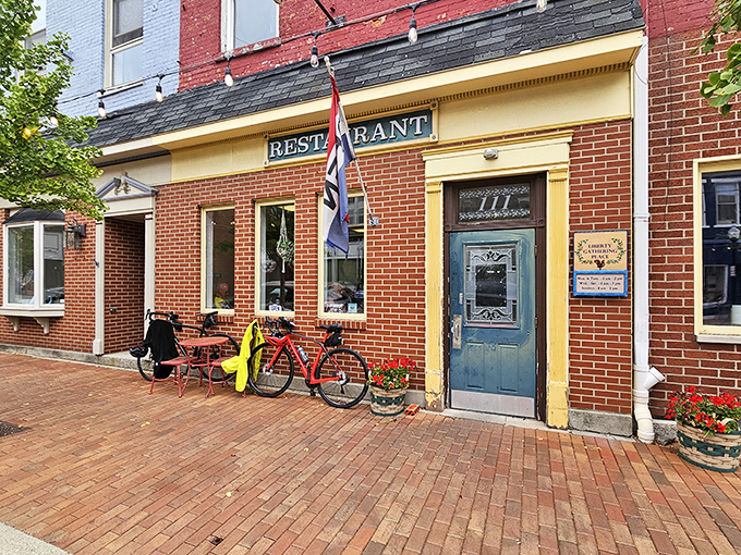 The iconic blue door with yellow trim welcomes you to Liberty Gathering Place, where small-town charm meets big-time flavor in West Liberty, Ohio.