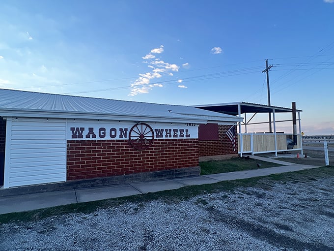 The Wagon Wheel Dance Hall stands proudly like a mirage of barbecue dreams in the Texas countryside.