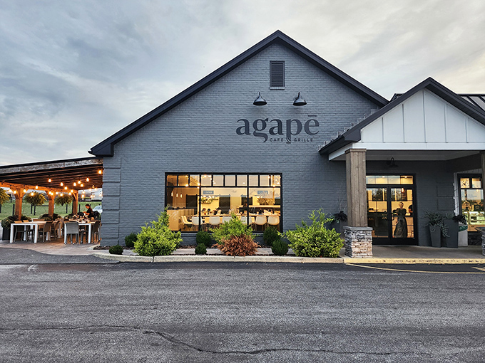 Agapē's sleek gray exterior belies the culinary treasures within. The inviting patio with string lights promises memorable dining under Pennsylvania skies.