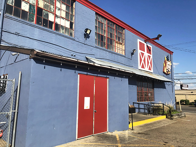The blue barn-like exterior of Sweet Lucy's stands as a beacon of barbecue hope in Northeast Philly&mdash;architectural proof that great BBQ needs no fancy facade.