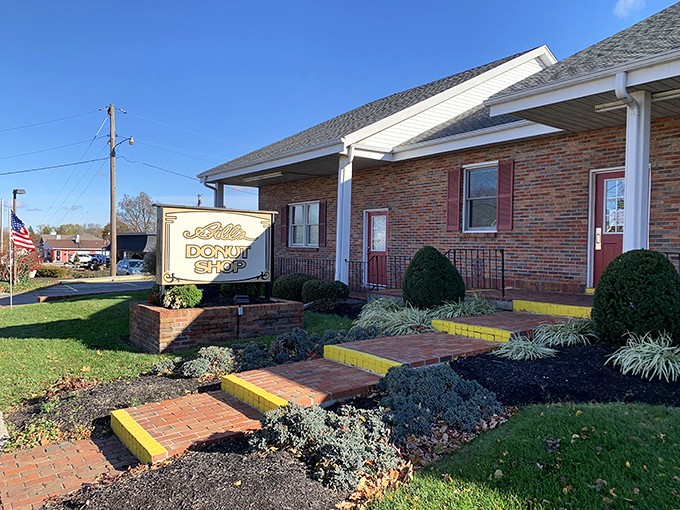 The unassuming brick exterior of Bill's Donut Shop stands like a temple to fried dough, complete with American flag &ndash; patriotism never tasted so sweet.