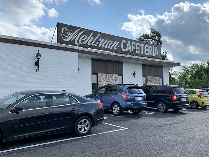 That packed parking lot tells the whole story - when locals choose this over chain restaurants, magic happens inside.