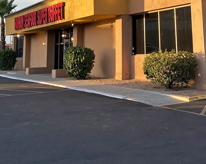 The red sign beckons like a lighthouse for hungry souls adrift in a sea of chain restaurants. Harbor Seafood's modest exterior hides treasures within.