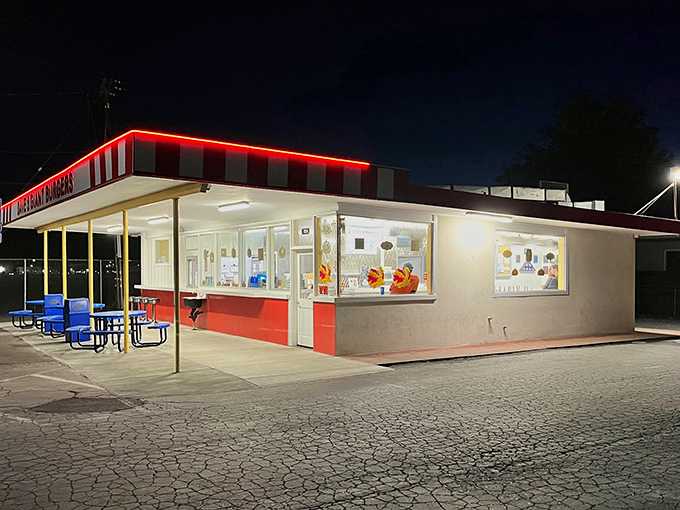 The red and white striped awning isn't just decoration—it's a beacon for burger lovers. Dave's Giant Hamburgers stands proudly in Fairfield, promising satisfaction without pretension.