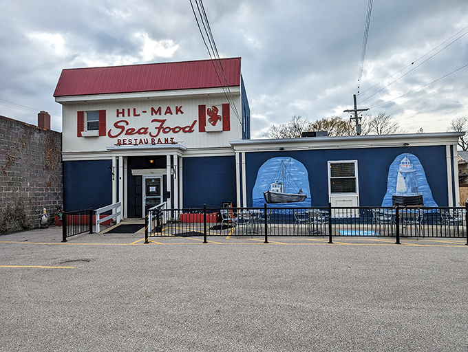 The nautical charm hits you before the first bite! Hil-Mak's blue exterior with hand-painted murals promises seafood treasures within this unassuming Ashtabula gem.