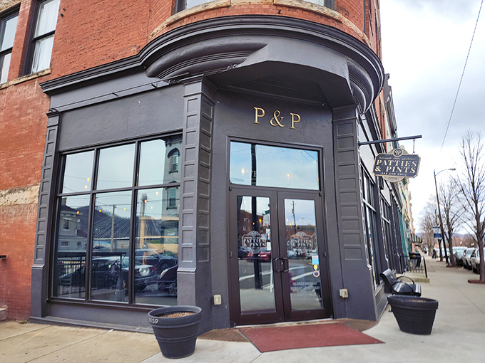 The corner entrance to culinary happiness. Patties & Pints' historic brick building stands like a sentinel guarding Portsmouth's best-kept secret.