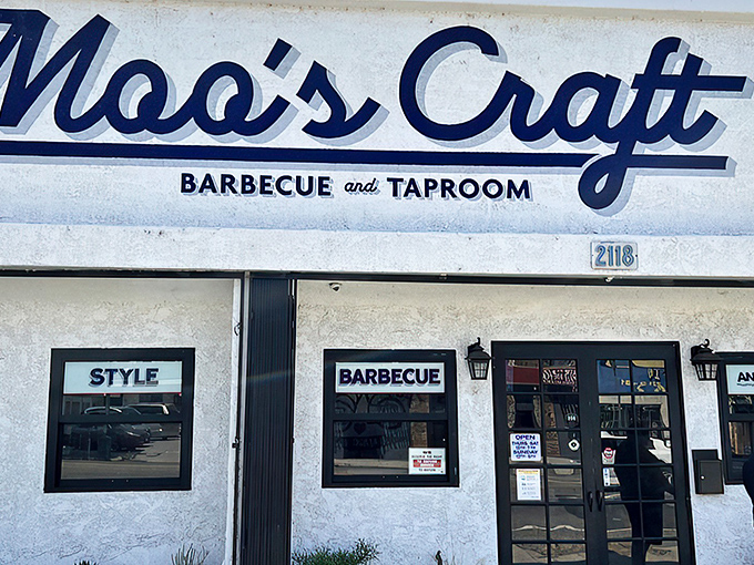 The unassuming storefront of Moo's Craft Barbecue belies the smoky treasures within. Like finding a Picasso at a yard sale.