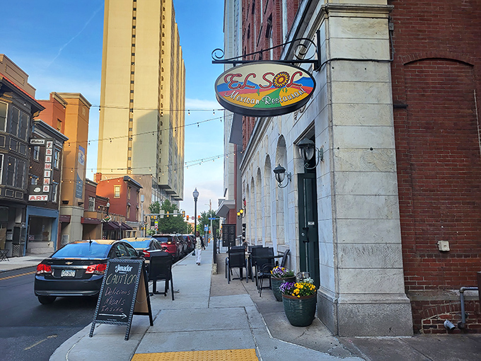 El Sol's vibrant sign beckons from downtown Harrisburg like a colorful lighthouse guiding hungry travelers to authentic Mexican shores.