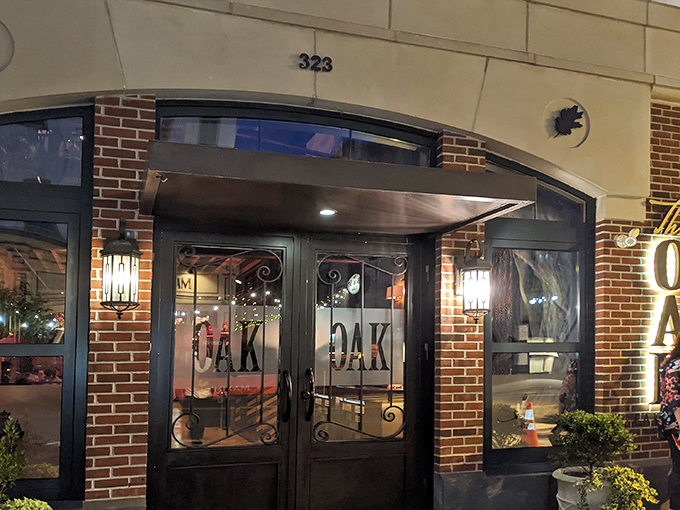 Three Oak Steakhouse stands proudly on its Easton corner, its classic brick fa&ccedil;ade promising culinary adventures within. The cobalt planters add just the right pop of color.