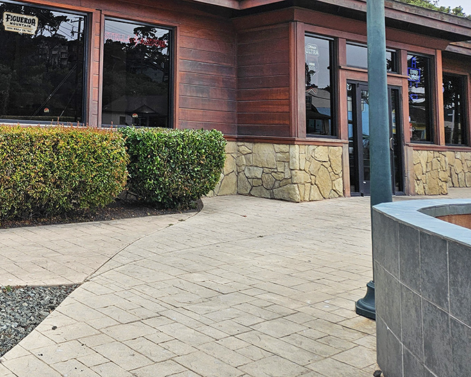 The unassuming exterior of Main Street Grill in Cambria hides culinary treasures within. Like finding a diamond in a haystack, but the haystack is delicious too.