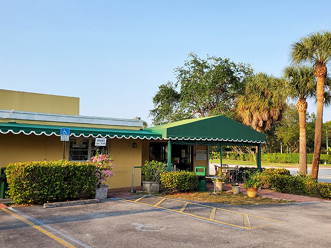 The unassuming yellow building with its green awning and sign might not look like a culinary destination, but locals know better&mdash;sandwich paradise awaits inside.