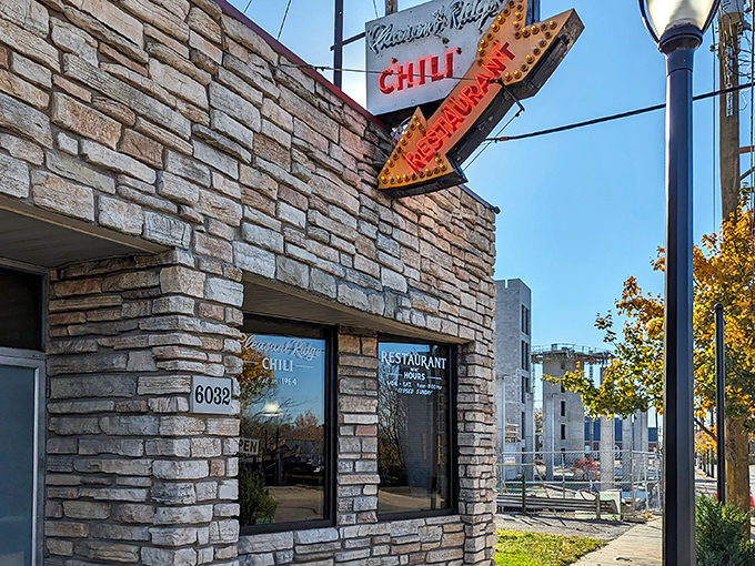 The stone facade and vintage signage of Pleasant Ridge Chili stands as a beacon of comfort food in Cincinnati. Breakfast anytime? Now that's my kind of place!