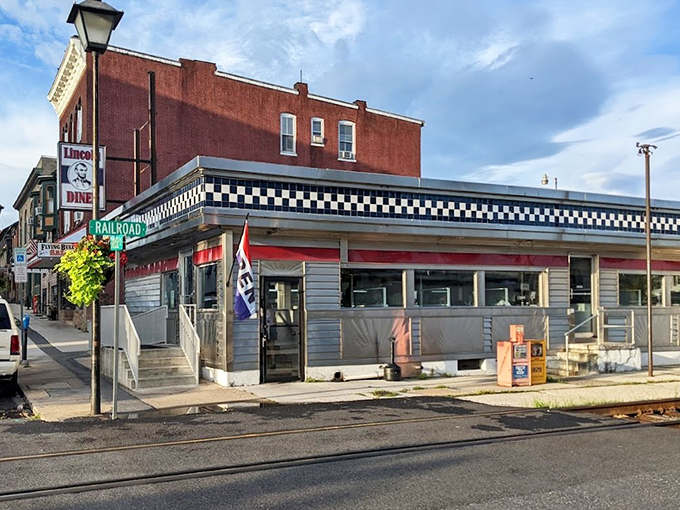 The classic black and white checkered trim of Lincoln Diner beckons hungry travelers like a culinary lighthouse on Gettysburg's Carlisle Street.