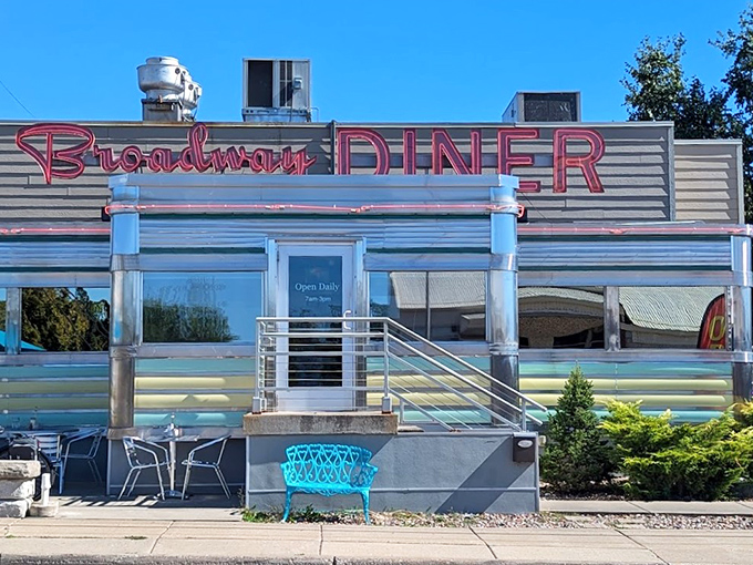 The gleaming stainless steel exterior of Broadway Diner stands like a time capsule in Baraboo, beckoning hungry travelers with its classic Americana charm.