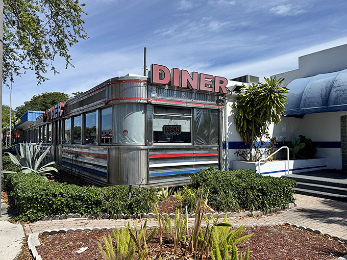 That gleaming stainless steel exterior isn't just eye-catching&mdash;it's a time machine disguised as a diner. Classic Americana with a Florida twist!