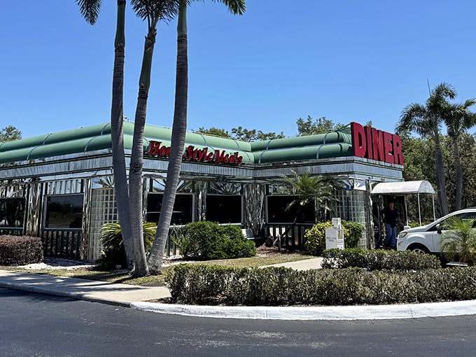 The classic mint-green awning and bold red signage announce "comfort food ahead" like a beacon for hungry travelers on U.S. Highway 27.