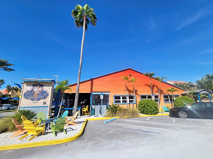 Those rainbow Adirondack chairs aren't just for show—they're an invitation to slow down and savor life, Florida-style. The Conch Republic's vibrant exterior sets the perfect tone for what awaits inside.