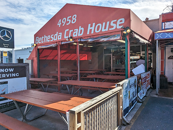 The iconic red awning of Bethesda Crab House stands as a beacon for crab lovers&mdash;no fancy frills, just the promise of seafood paradise within.