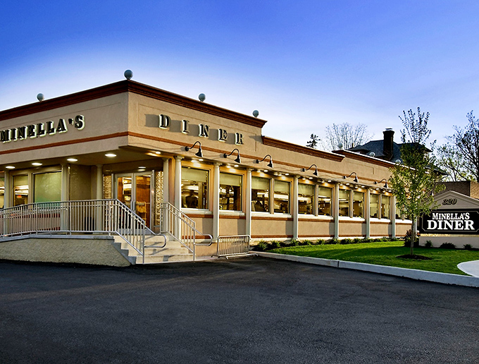 Minella's gleaming exterior stands like a beacon of comfort food hope on Lancaster Avenue, promising delicious salvation to hungry travelers day or night.