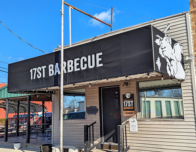 The unassuming exterior of 17th Street Barbecue proves once again that the best BBQ joints often look like places your GPS would apologize for sending you.